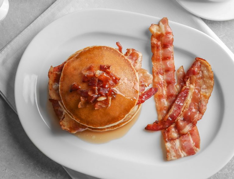 fluffy pancake stacks with crispy bacon and maple syrup - Masha